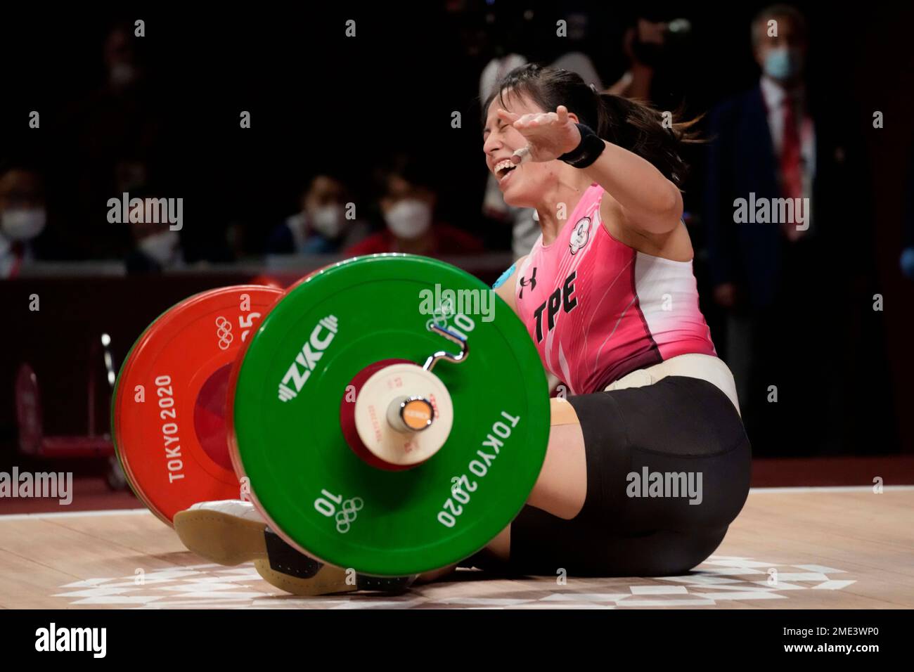 Kuo Hsing-Chun of Taiwan falls as the competes in the women's 59kg ...