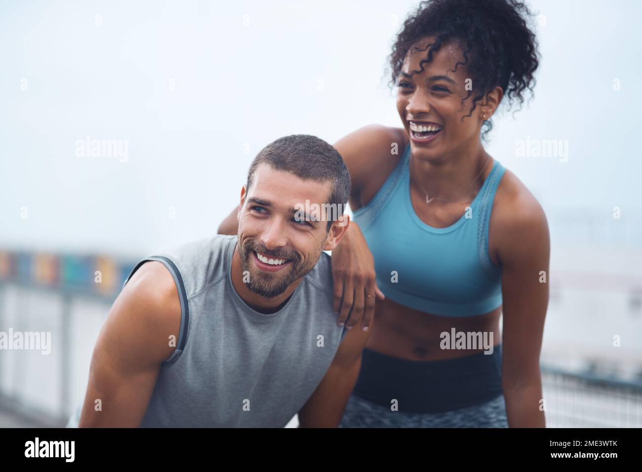 Lets get ready for round two. a sporty young couple taking a break ...