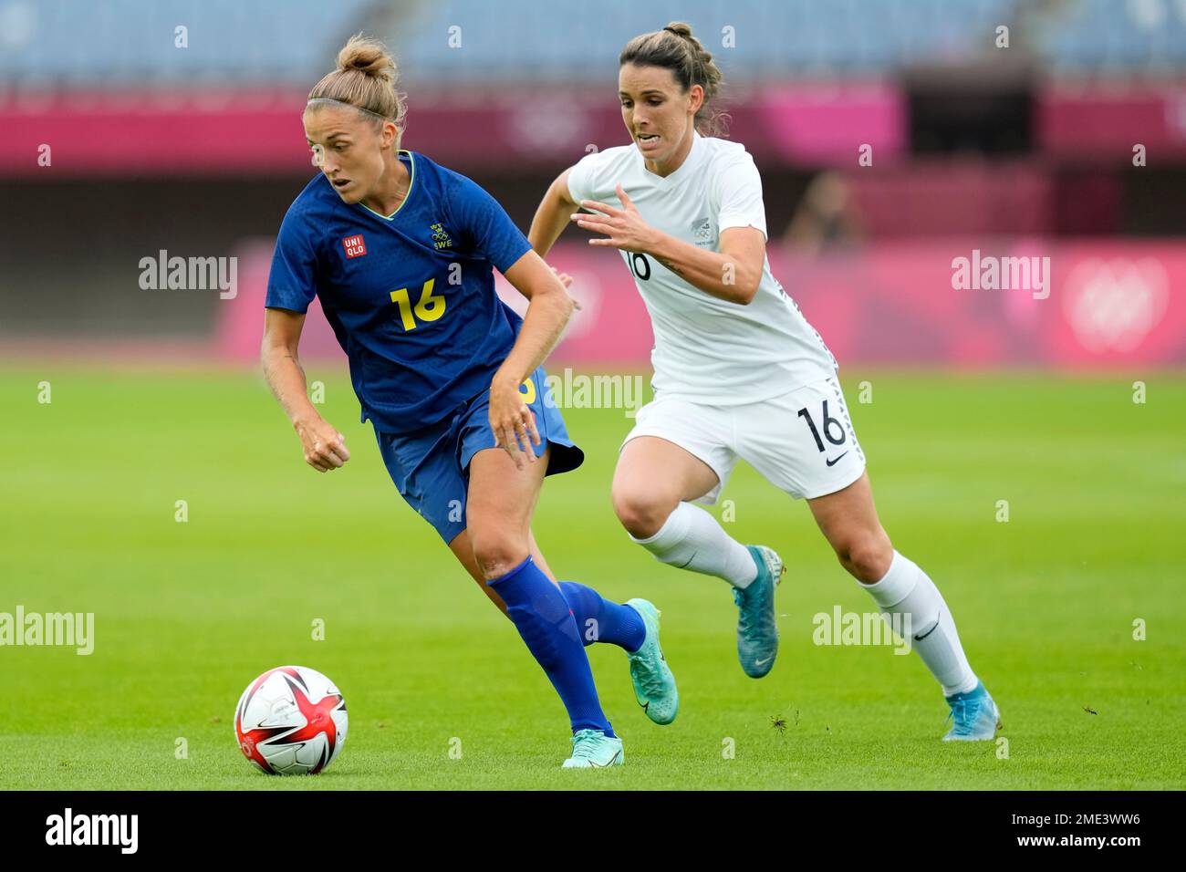 Sweden's Filippa Angeldal, left, dribbles the ball against New Zealand ...