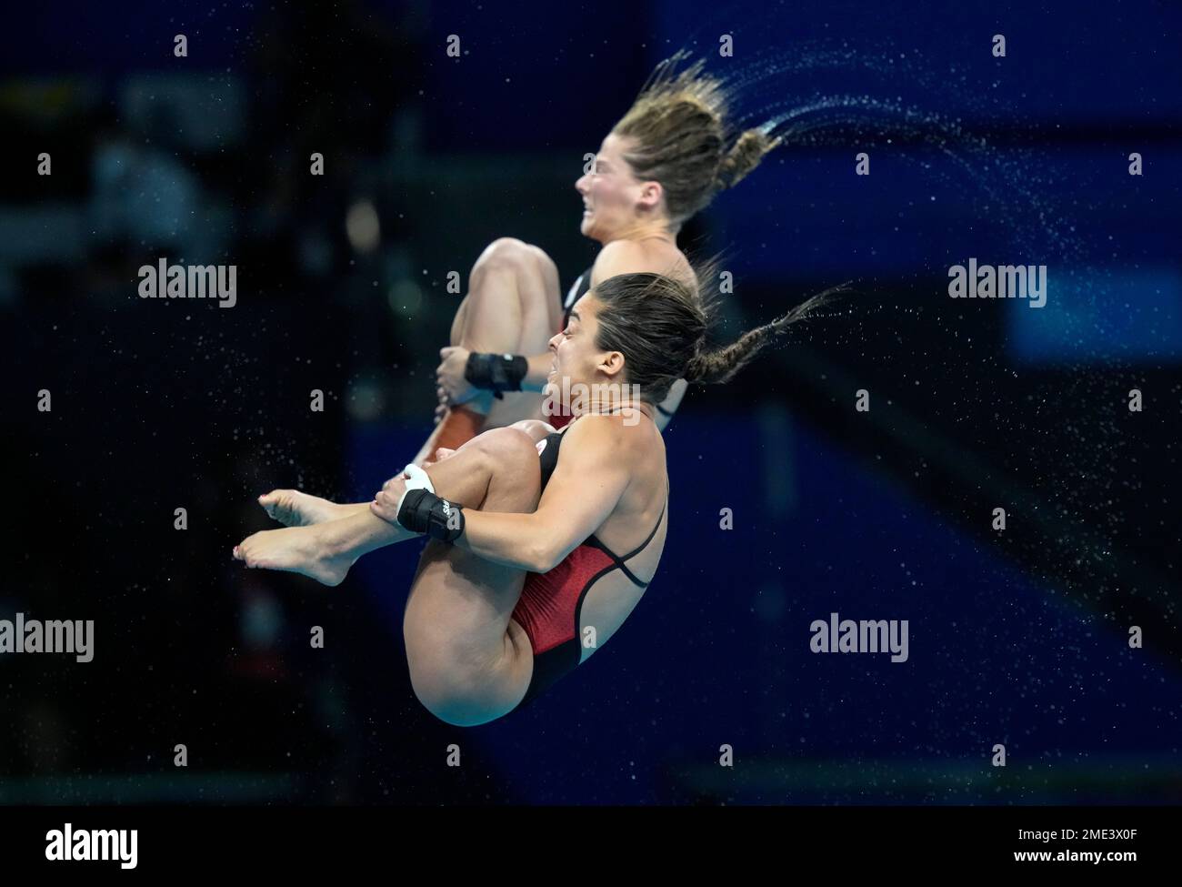 Meaghan Benfeito and Caeli Mckay of Canada compete during the women's ...