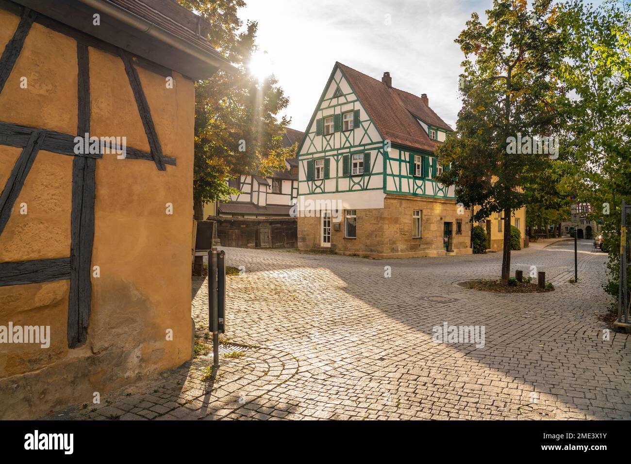 Germany, Bavaria, Forchheim, Empty cobblestone street in old town at ...