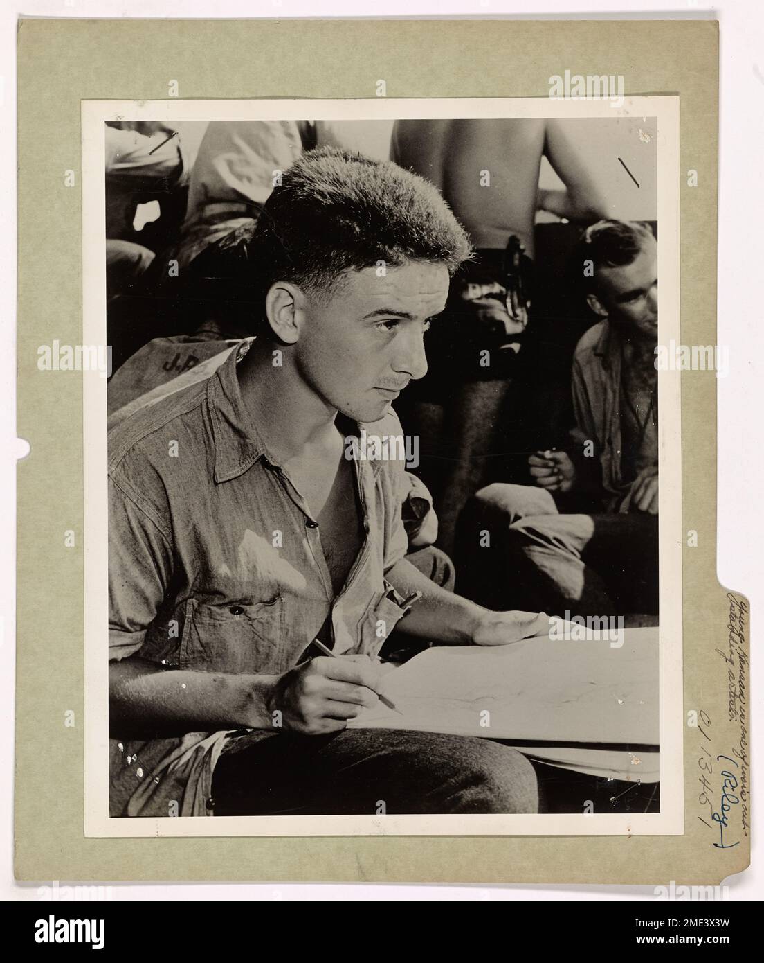 Coast Guard Combat Artist Ken Riley, from Parsons, Kansas, sketches ...