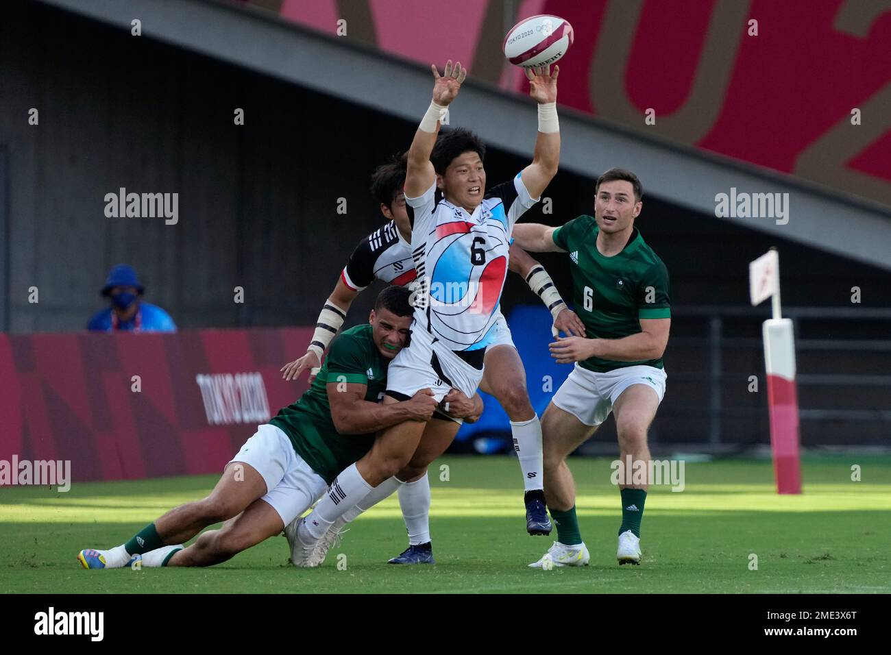 Ireland's Jordan Conroy tackles South Korea's Kim Nam-uk as Ireland's ...
