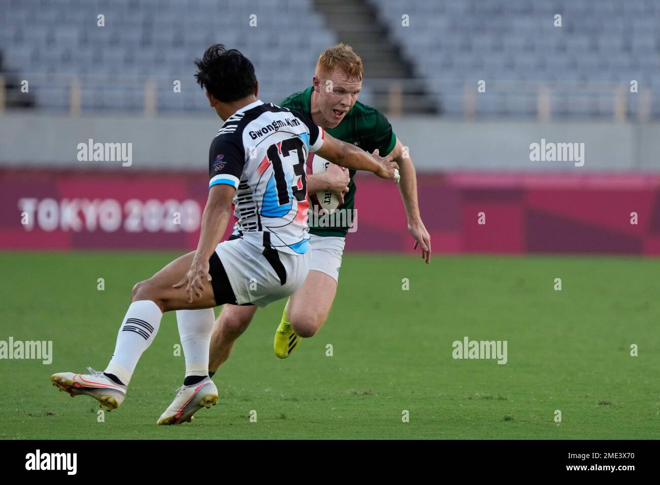 Ireland's Gavin Mullin gets past South Korea's Kim Gwong-min on his way ...