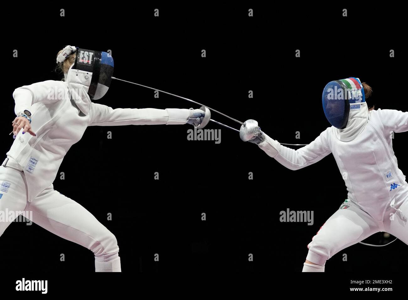 Federica Isola of Italy, right, and Katrina Lehis of Estonia compete in ...