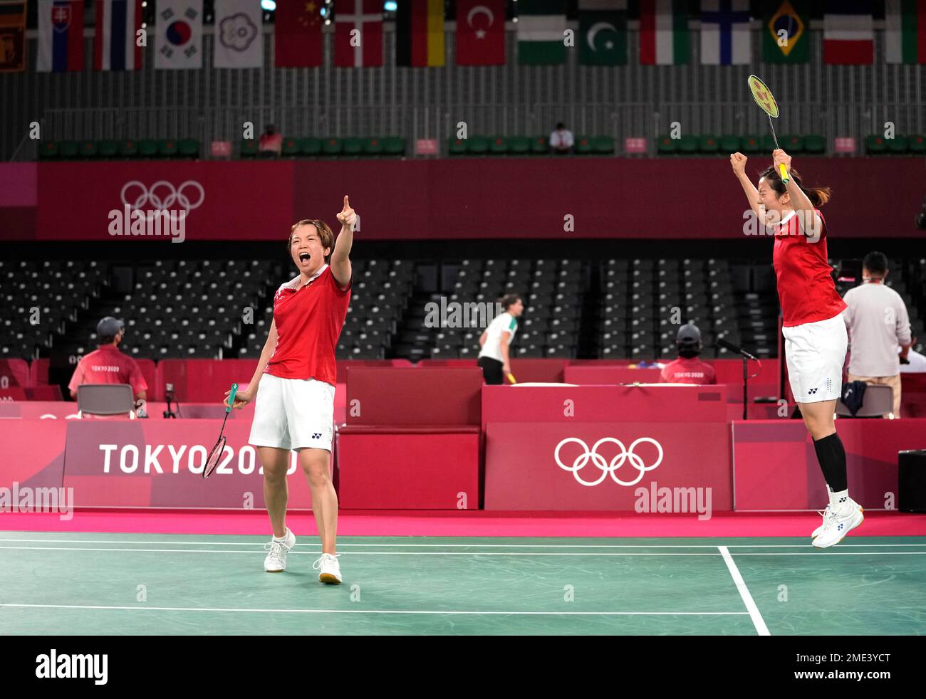China's Chen Qing Chen and Jia Yi Fan pcelebrate after winning the match against South Korea's ...