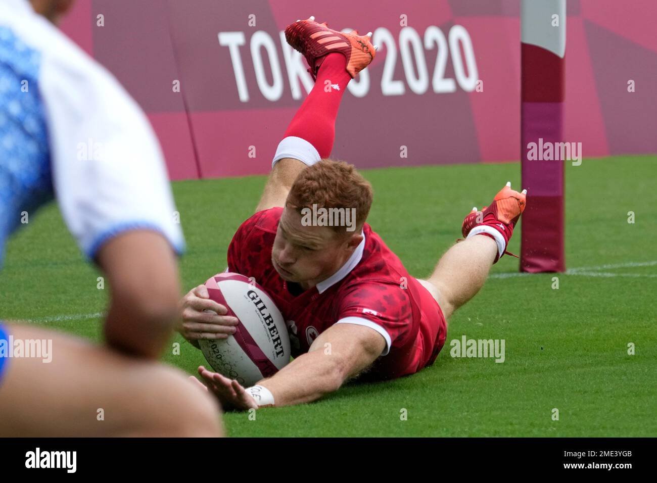 Canada's Connor Braid scores a try during their men's rugby sevens ...