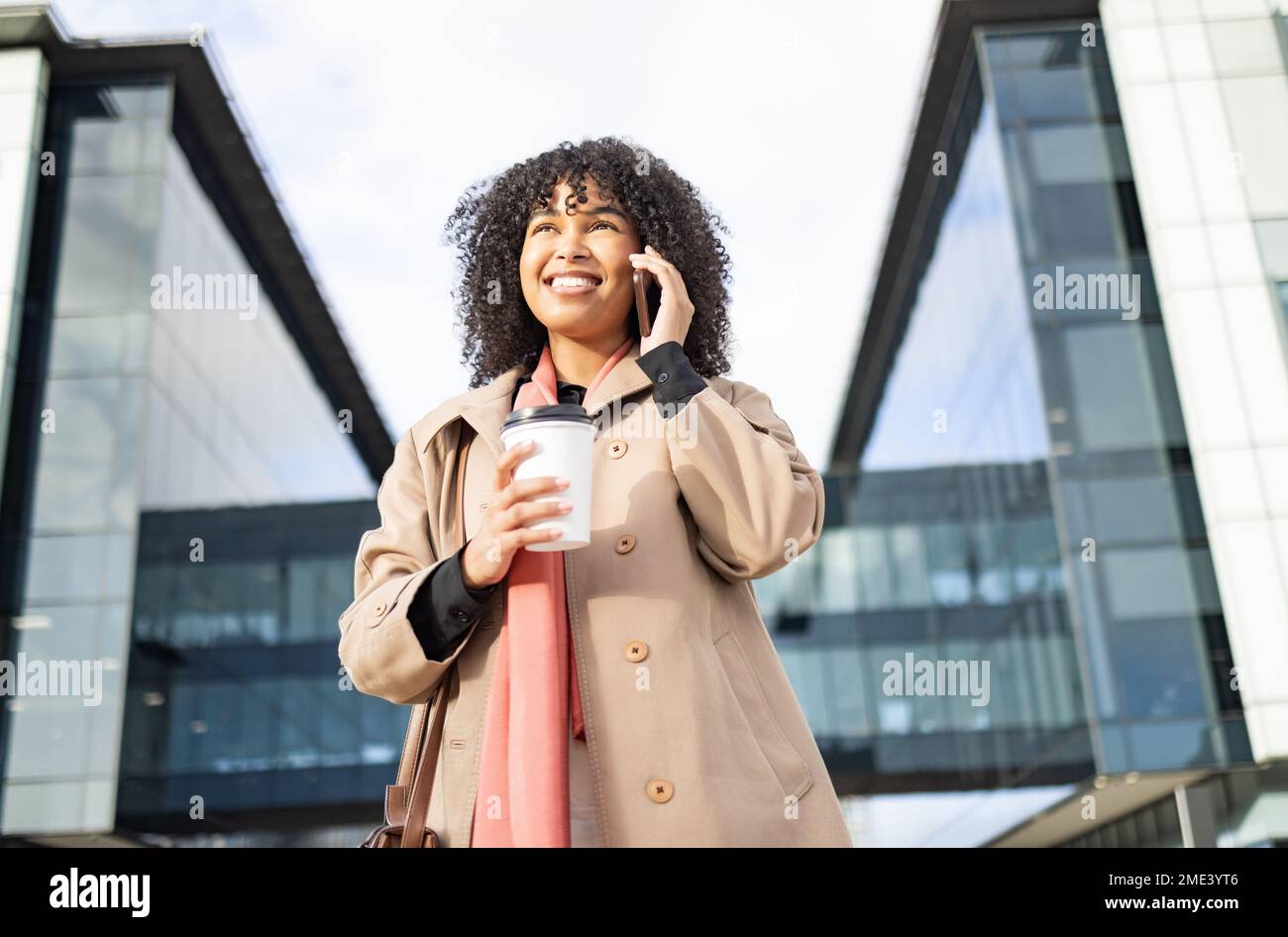 Phone call conversation, walking and happy black woman networking ...