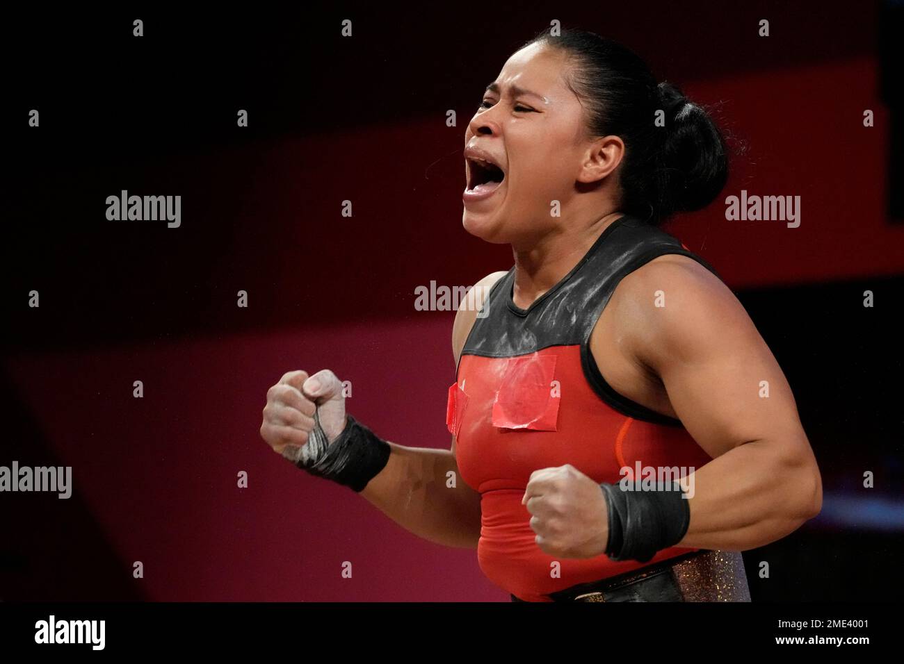 Sema Nancy Ludrick Rivas of Nicaragua reacts after lift as she competes ...