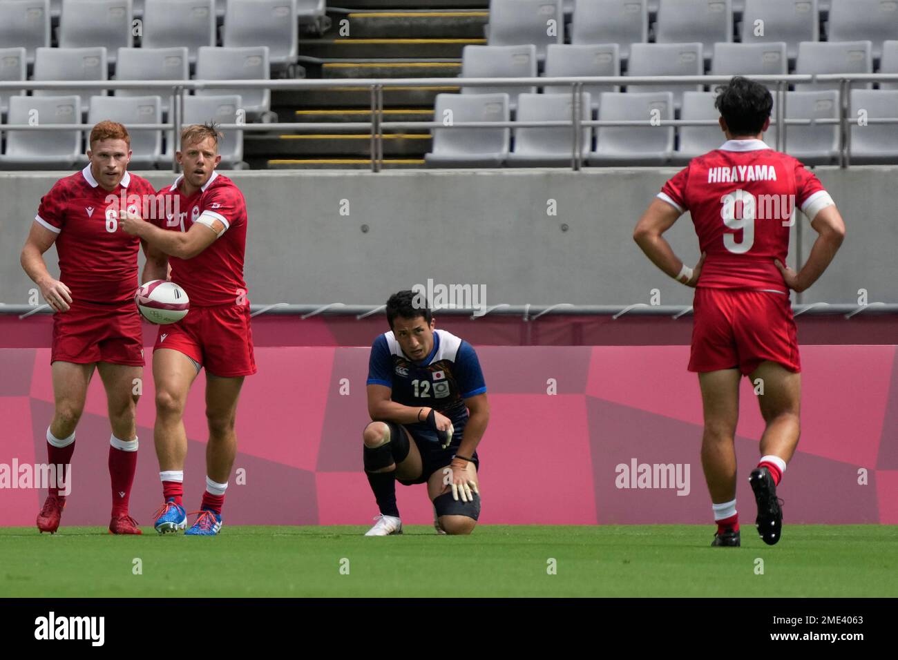 Canada's Connor Braid, left, is congratulated by teammate Harry Jones ...