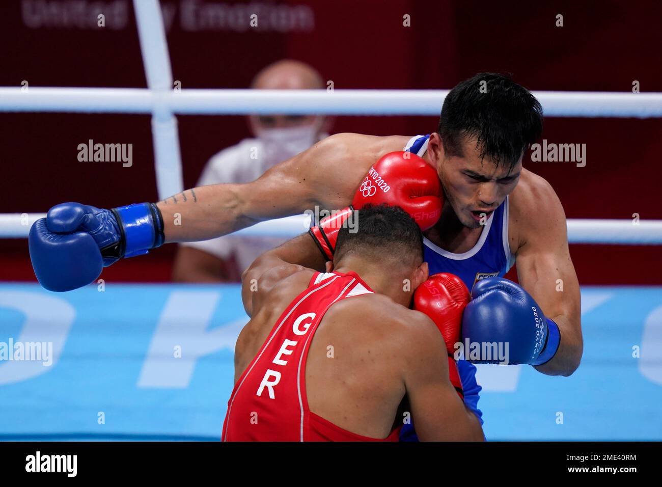 Ammar Riad Abduljabbar, of Germany, lands a shot to Jose Maria Lucar ...