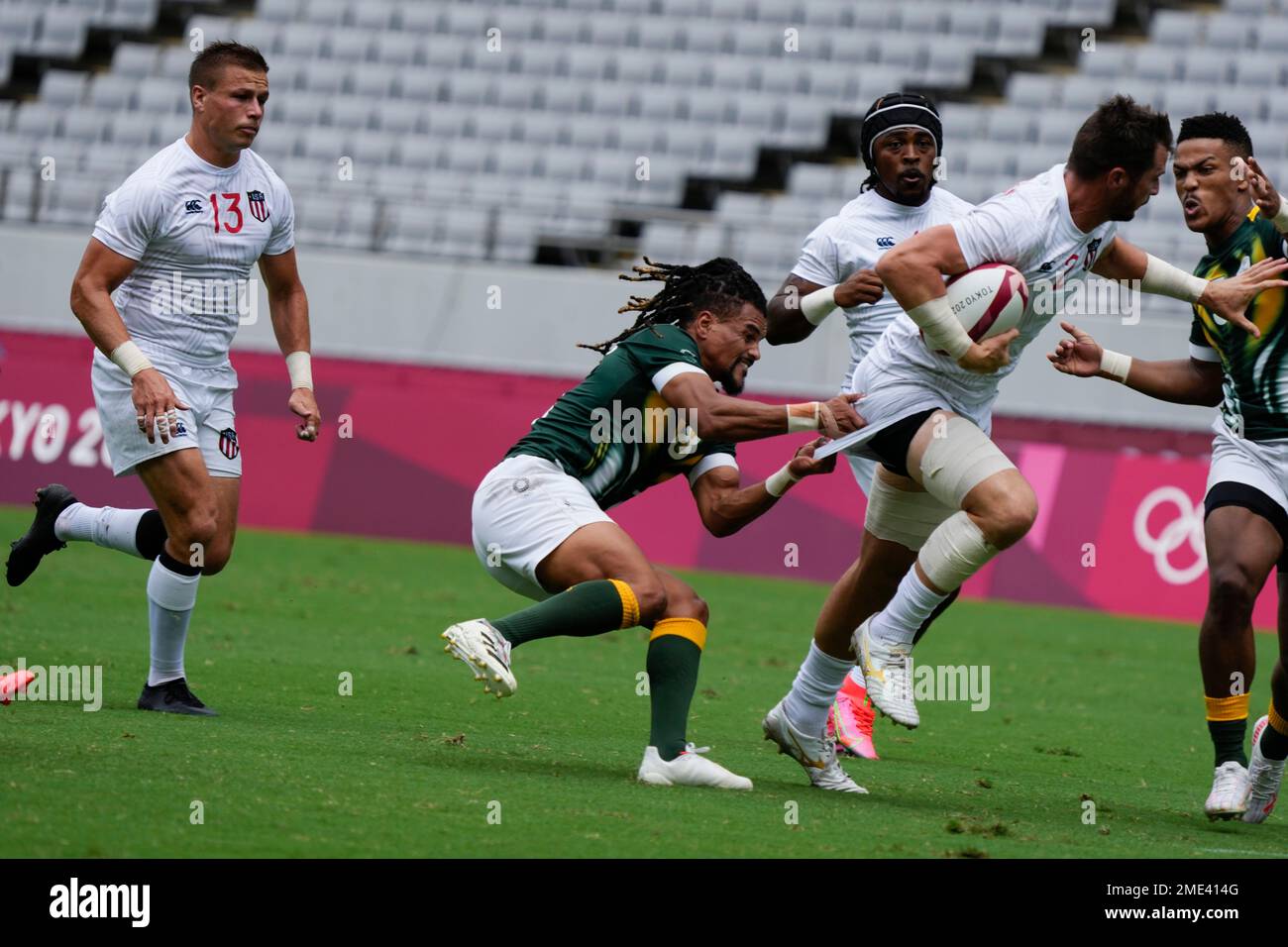 Brett Thompson of the United States gets past South Africa's Selvyn ...