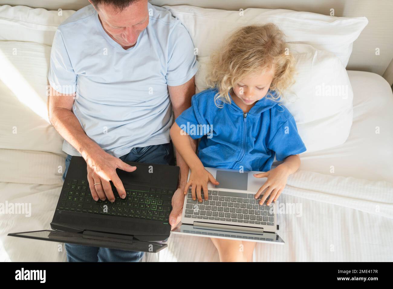 Girl on laptops hi-res stock photography and images - Alamy