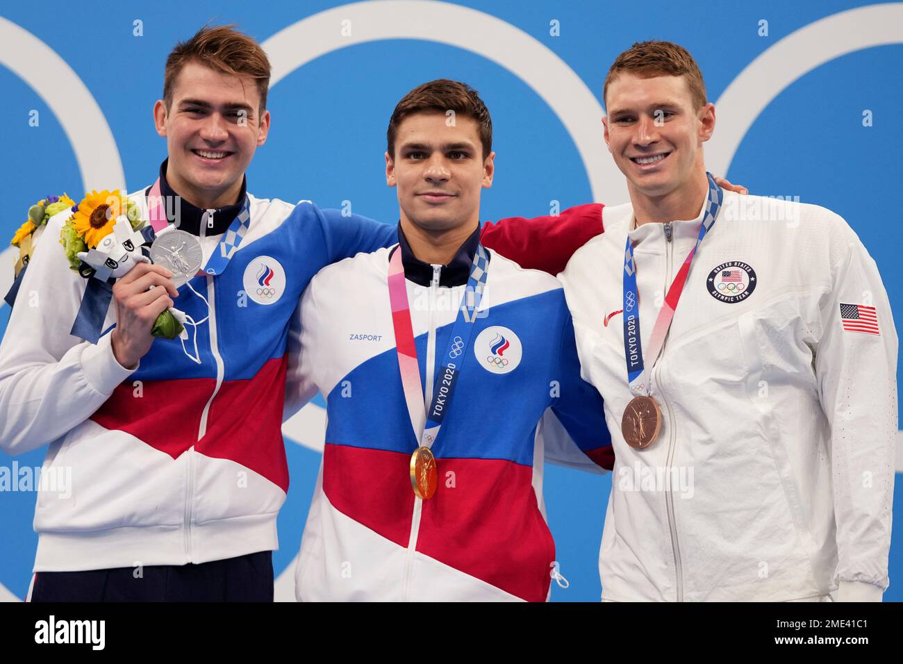 Gold medalist Evgeny Rylov, centre, of the Russian Olympic Committee ...