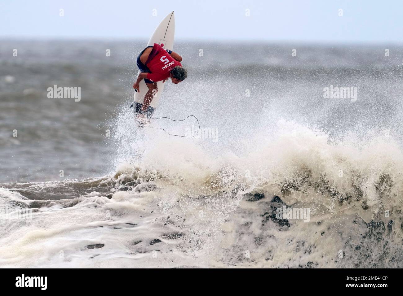 Japan's Kanoa Igarashi goes to the air on a wave during the semifinals ...