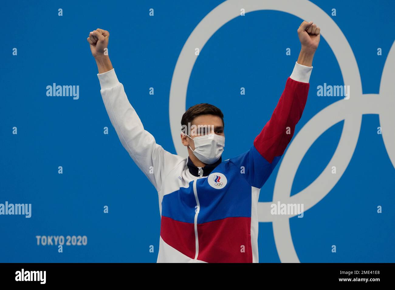 Evgeny Rylov, of the Russian Olympic Committee, stands the medal podium ...