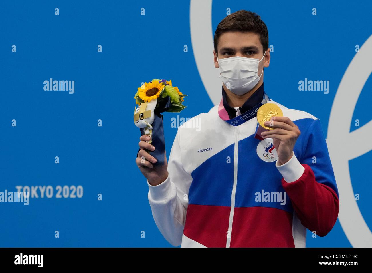 Evgeny Rylov, of the Russian Olympic Committee, poses with the gold ...