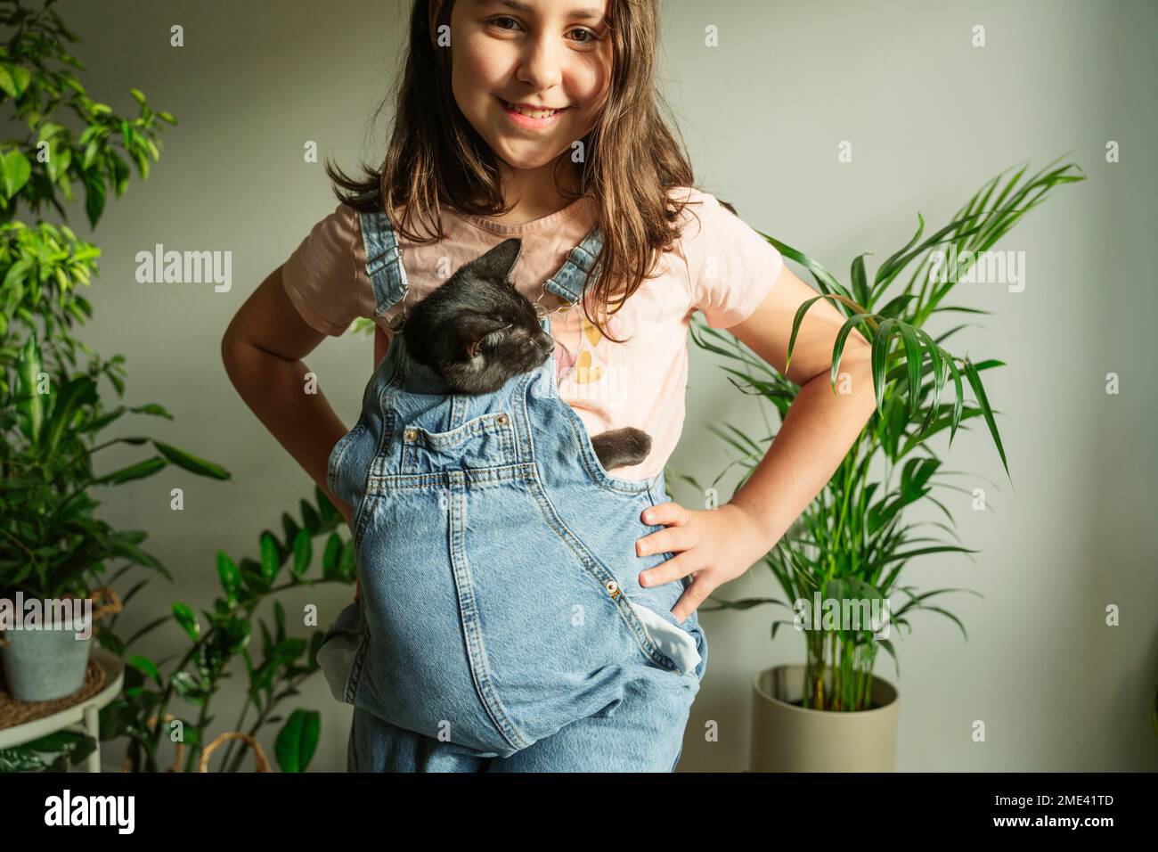 Girl cat standing hi-res stock photography and images - Alamy
