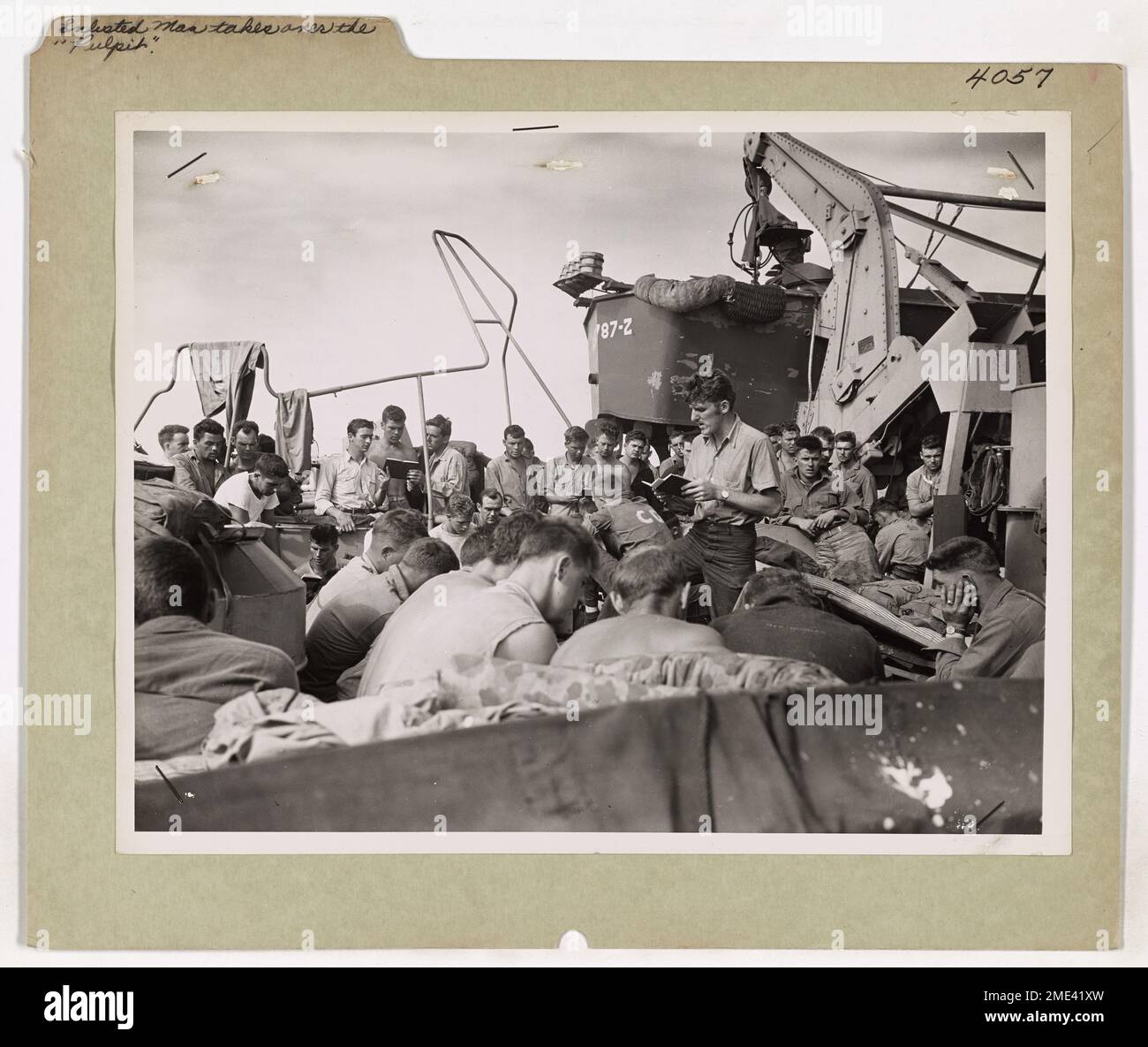 A Coast Guard sailor preaches and leads hymn singing aboard a Coast ...
