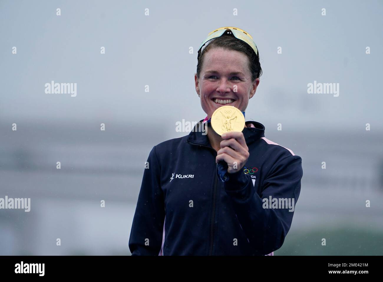 Flora Duffy of Bermuda holds her gold medal during a medal ceremony for ...