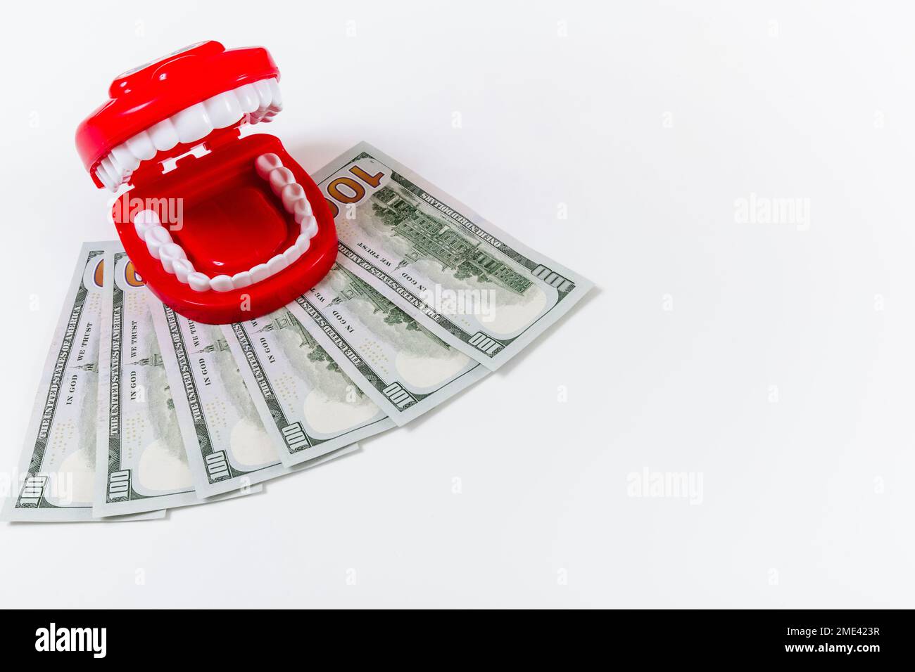 Children dentist toy with money. Insurance, cost of treatment. Medical ...
