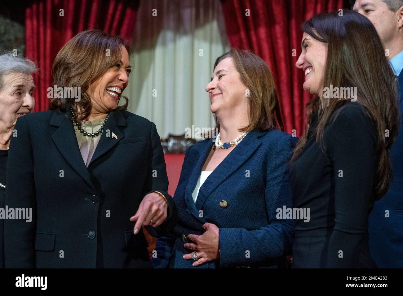Vice President Kamala Harris laughs with Laura Ricketts, sister of Sen ...