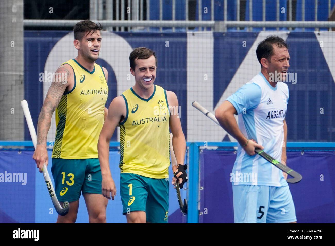 Australia's Lachlan Thomas Sharp, center, celebrates with Blake Govers ...