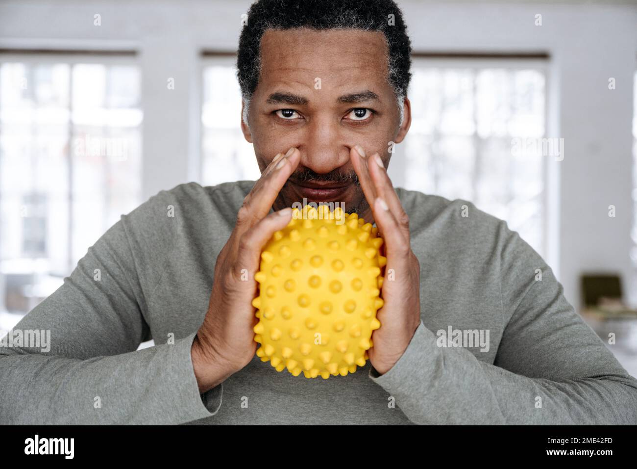 Squeezing stress ball hi-res stock photography and images - Alamy