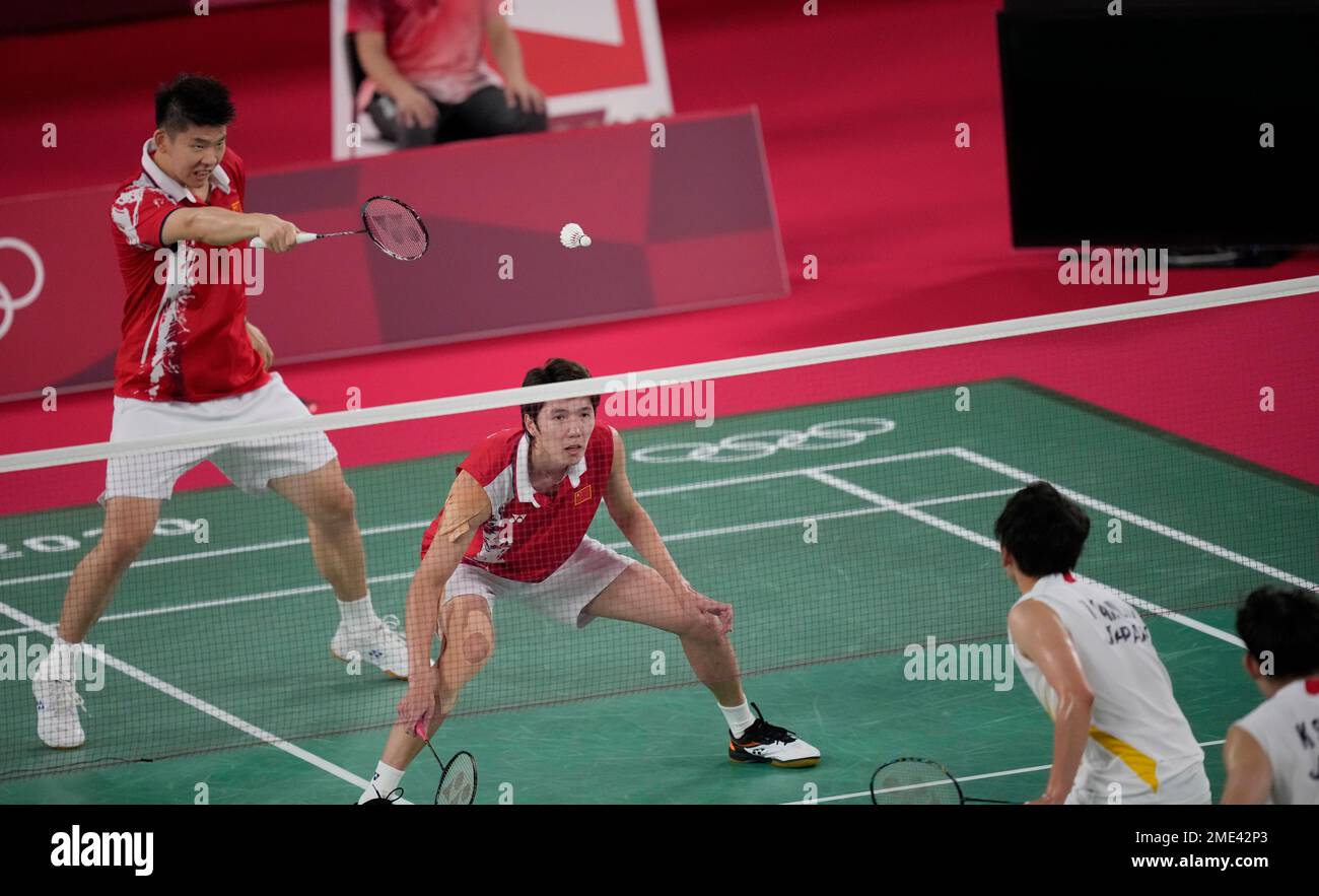 China's Li Jun Hui and Liu Yu Chen play against Japan's Takeshi Kamura ...