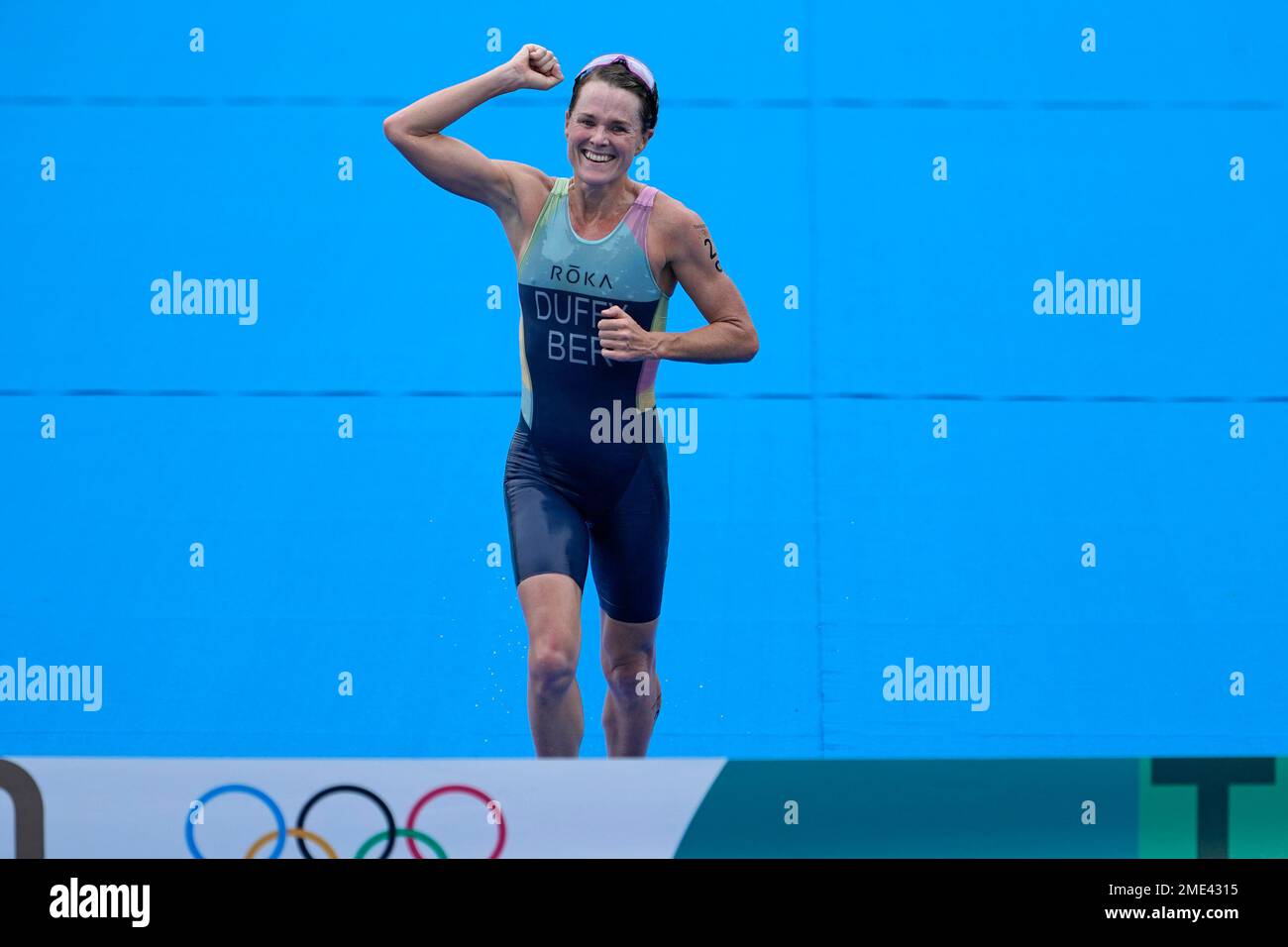 Flora Duffy of Team Bermuda celebrates as she approaches the finish ...