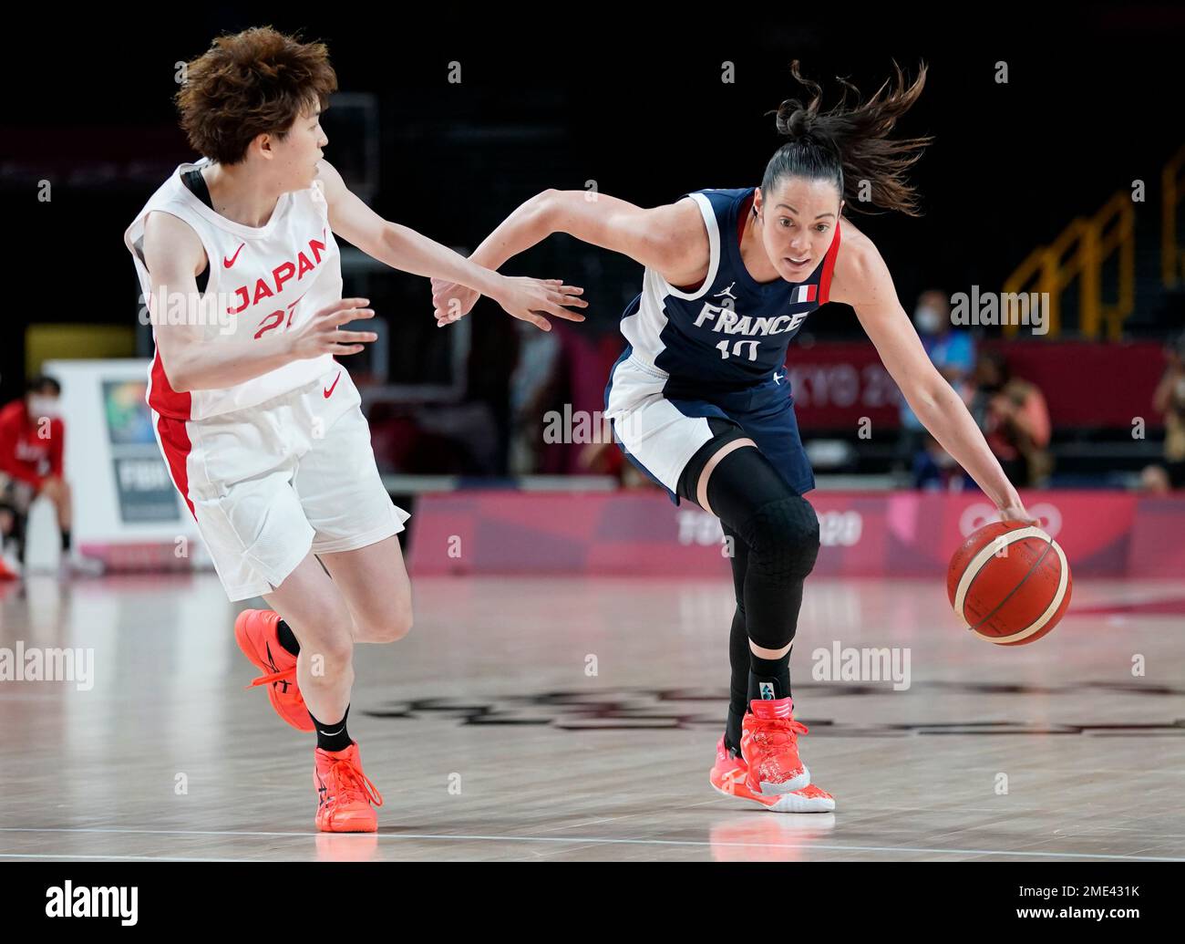 France's Sarah Michel (10) drives to the basket past Japan's Saki ...