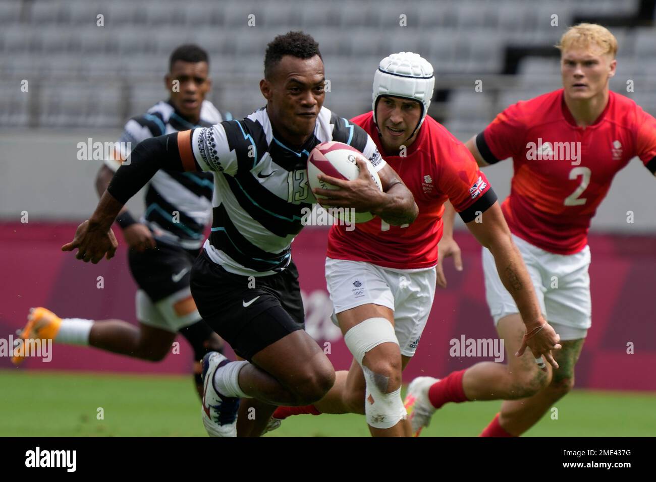 CORRECTS TO BRITAIN FROM CANADA - Fiji’s Sireli Maqala, center left, is ...
