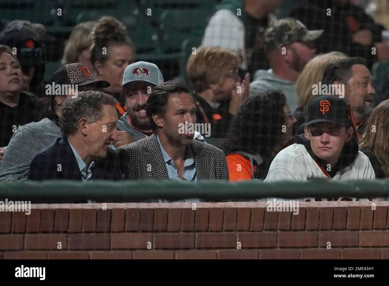 San Francisco Giants CEO Larry Baer, left, talks with Giants draft pick ...
