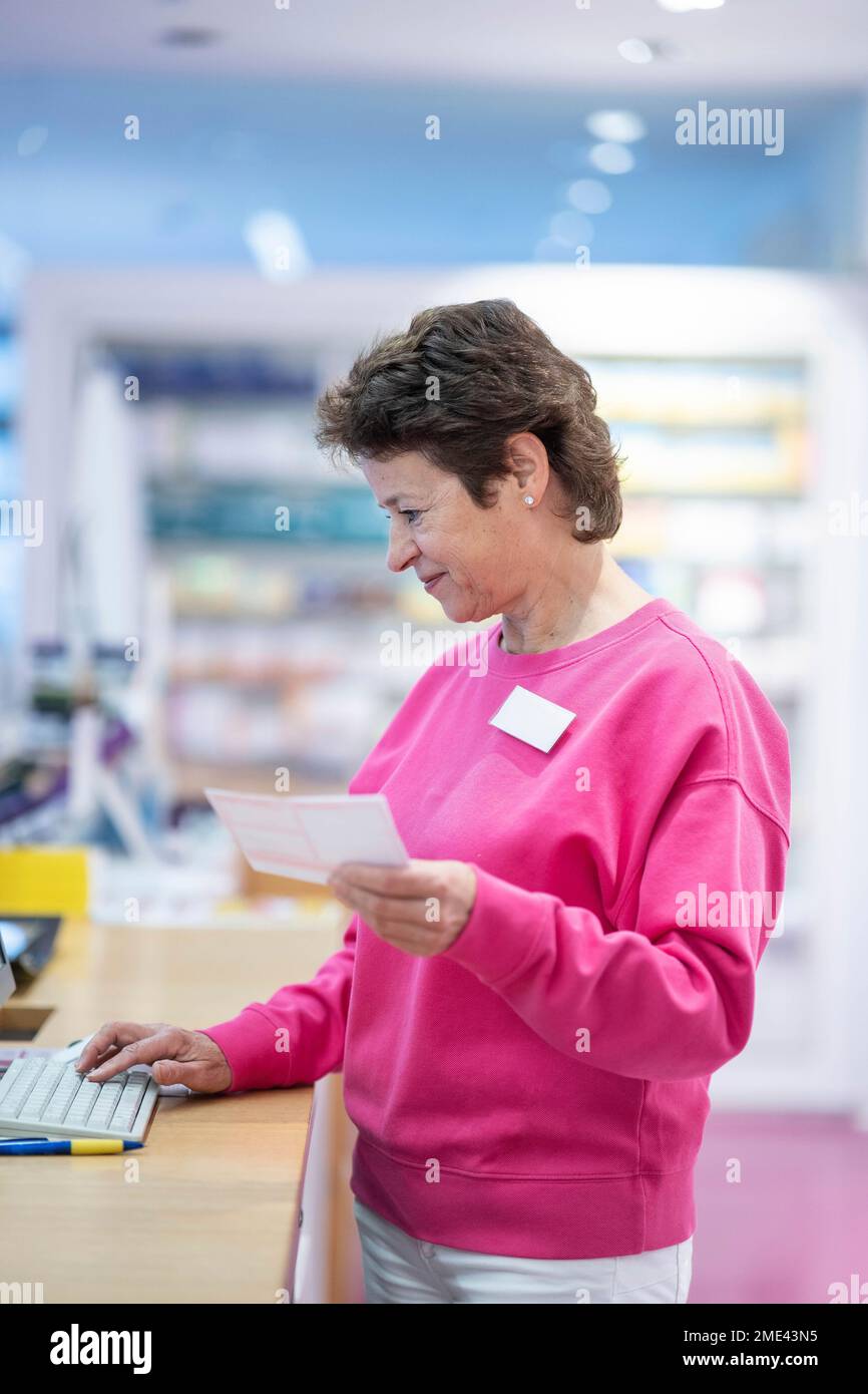 Pharmacist at her desk hi-res stock photography and images - Alamy