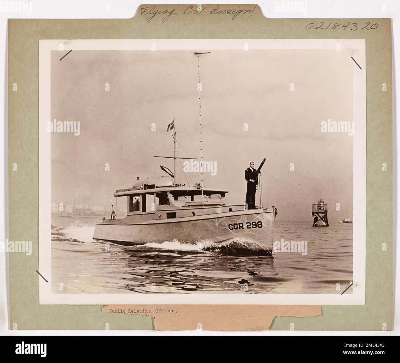 A U.S. Coast Guard officer inspects a vessel as part of port security ...