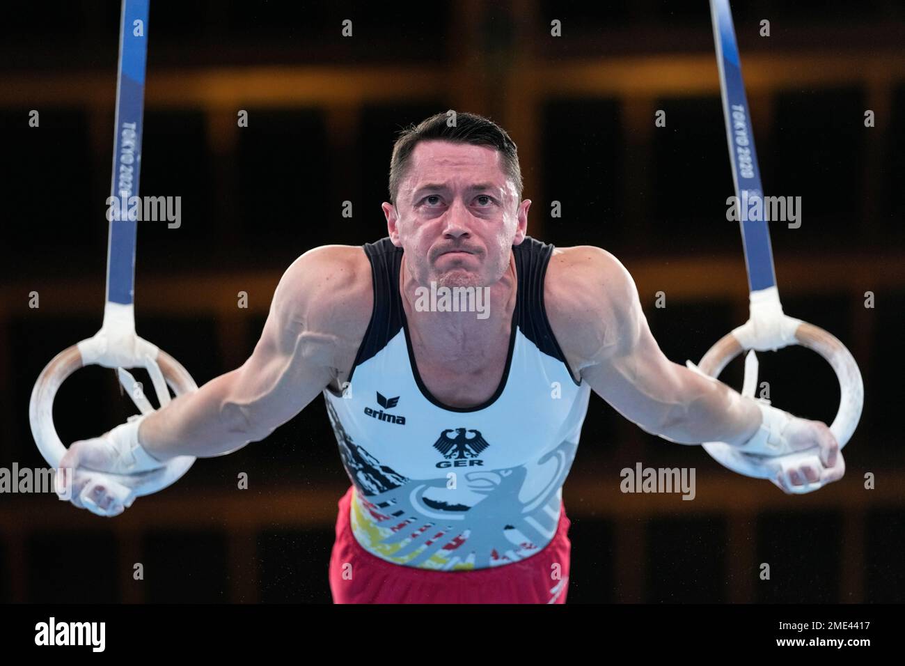 Andreas Toba, of Germany, performs on the rings during the artistic ...