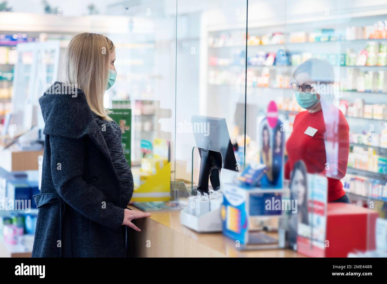 Customer standing at counter hi-res stock photography and images - Alamy