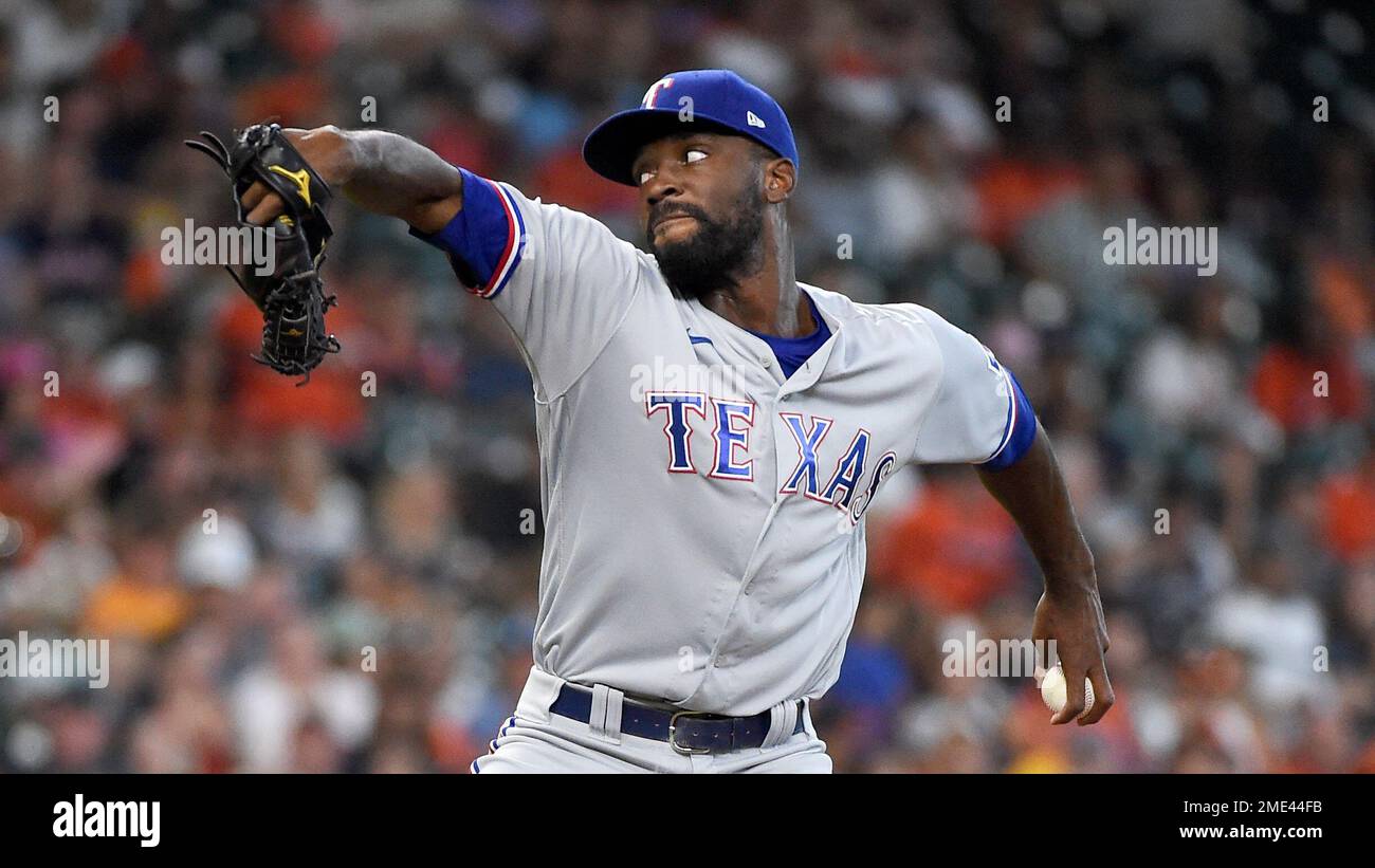 Texas Rangers starting pitcher Taylor Hearn delivers during the first ...
