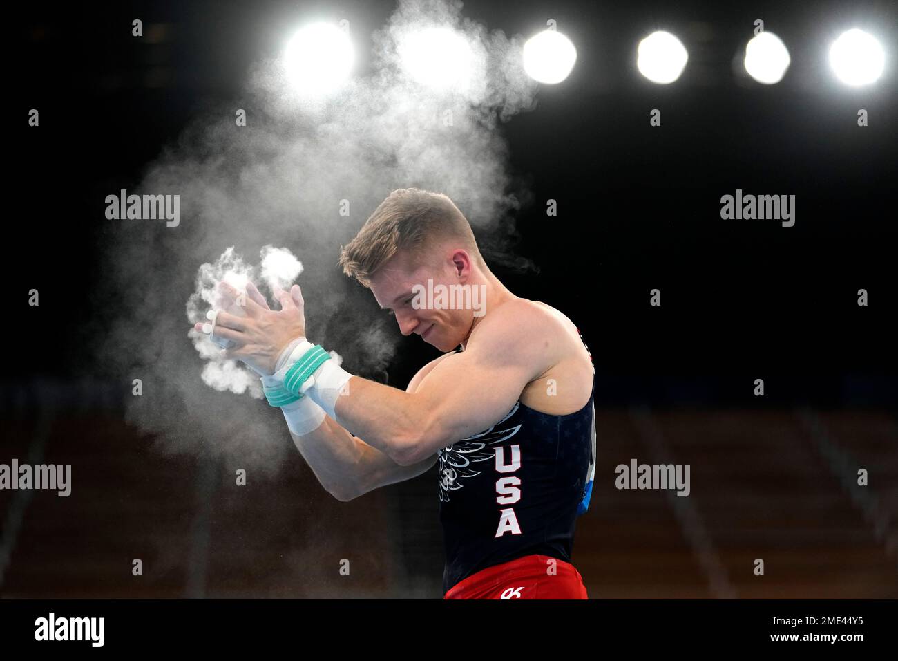 Shane Wiskus, of the United States, reacts after finishing his ...