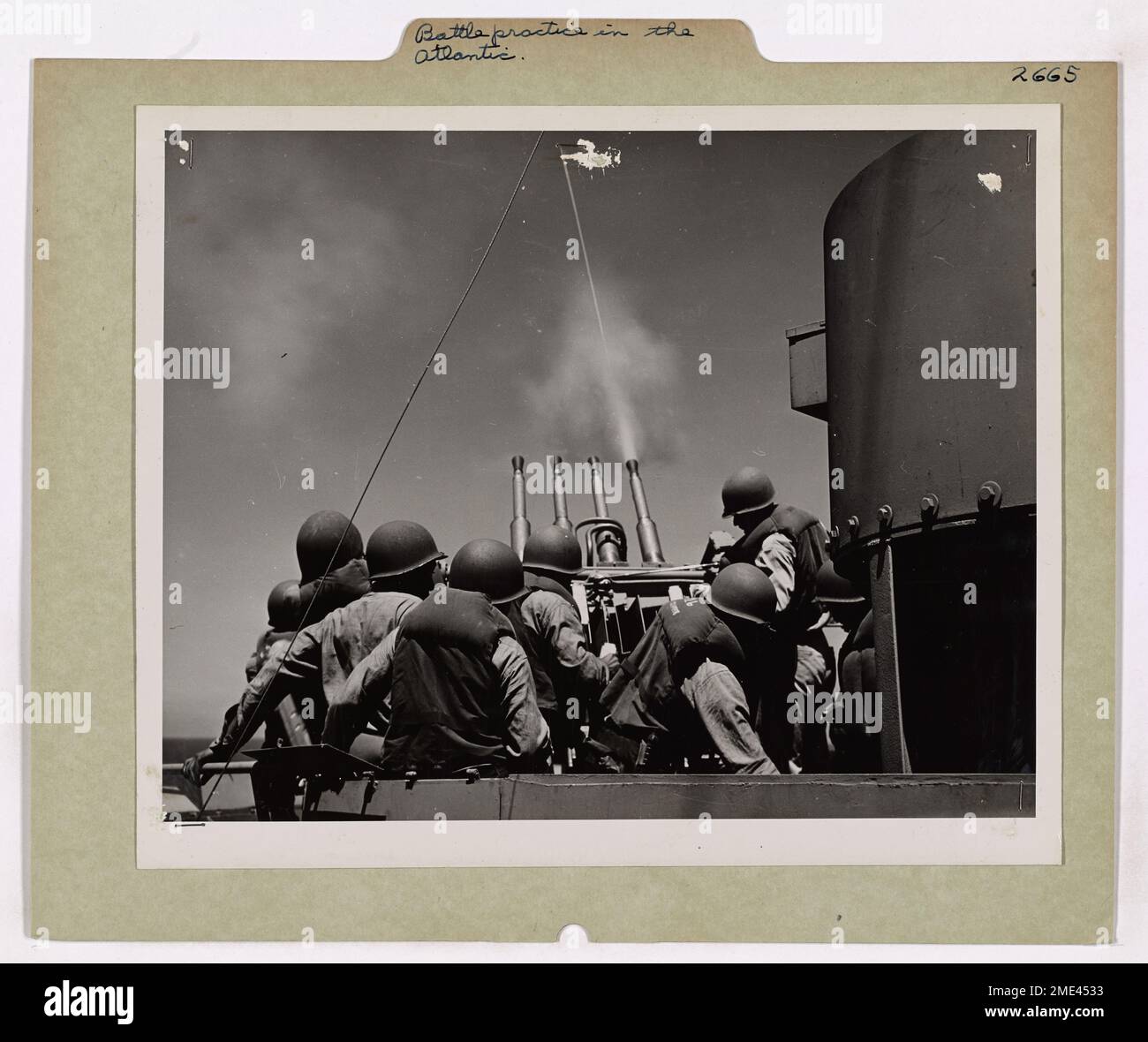 A Coast Guard gun crew participates in anti-aircraft training during ...