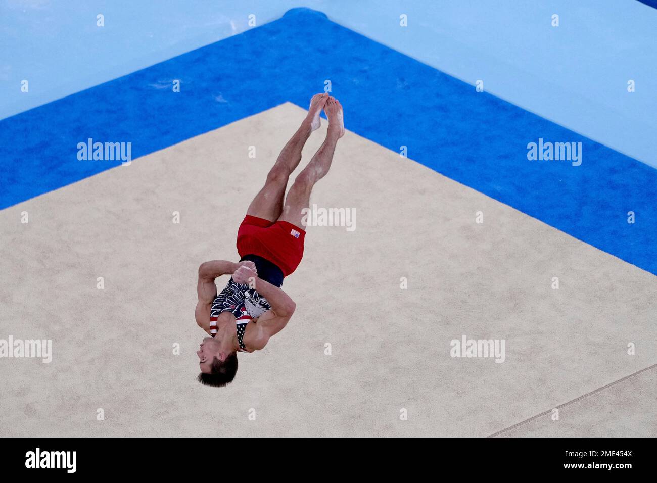 Samuel Mikulak, of the United States, performs on the floor exercise ...