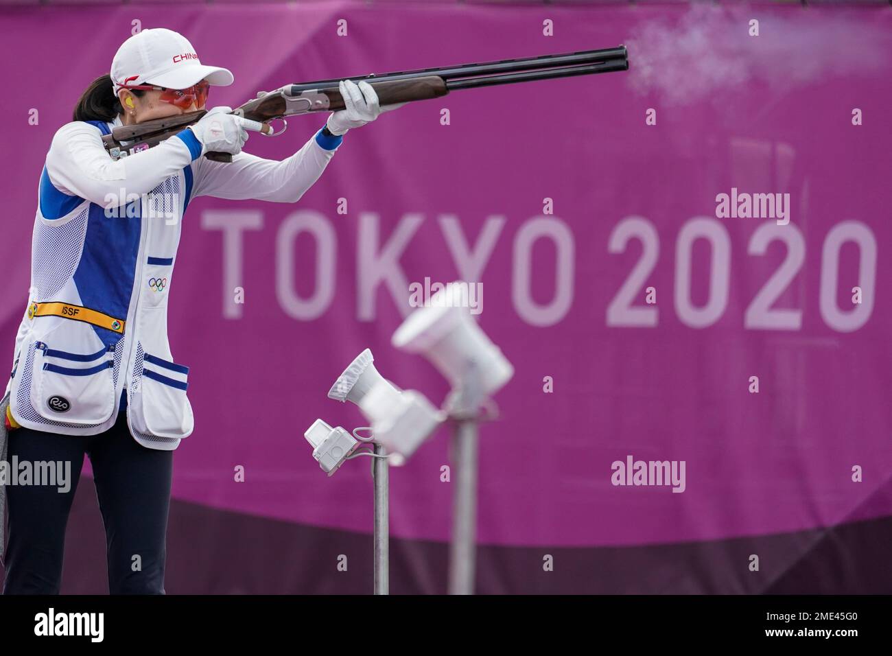 Wei Meng, of China, competes in the women's skeet at the Asaka Shooting ...