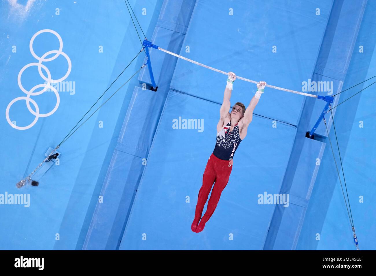 Shane Wiskus, of the United States, performs on the horizontal bar ...