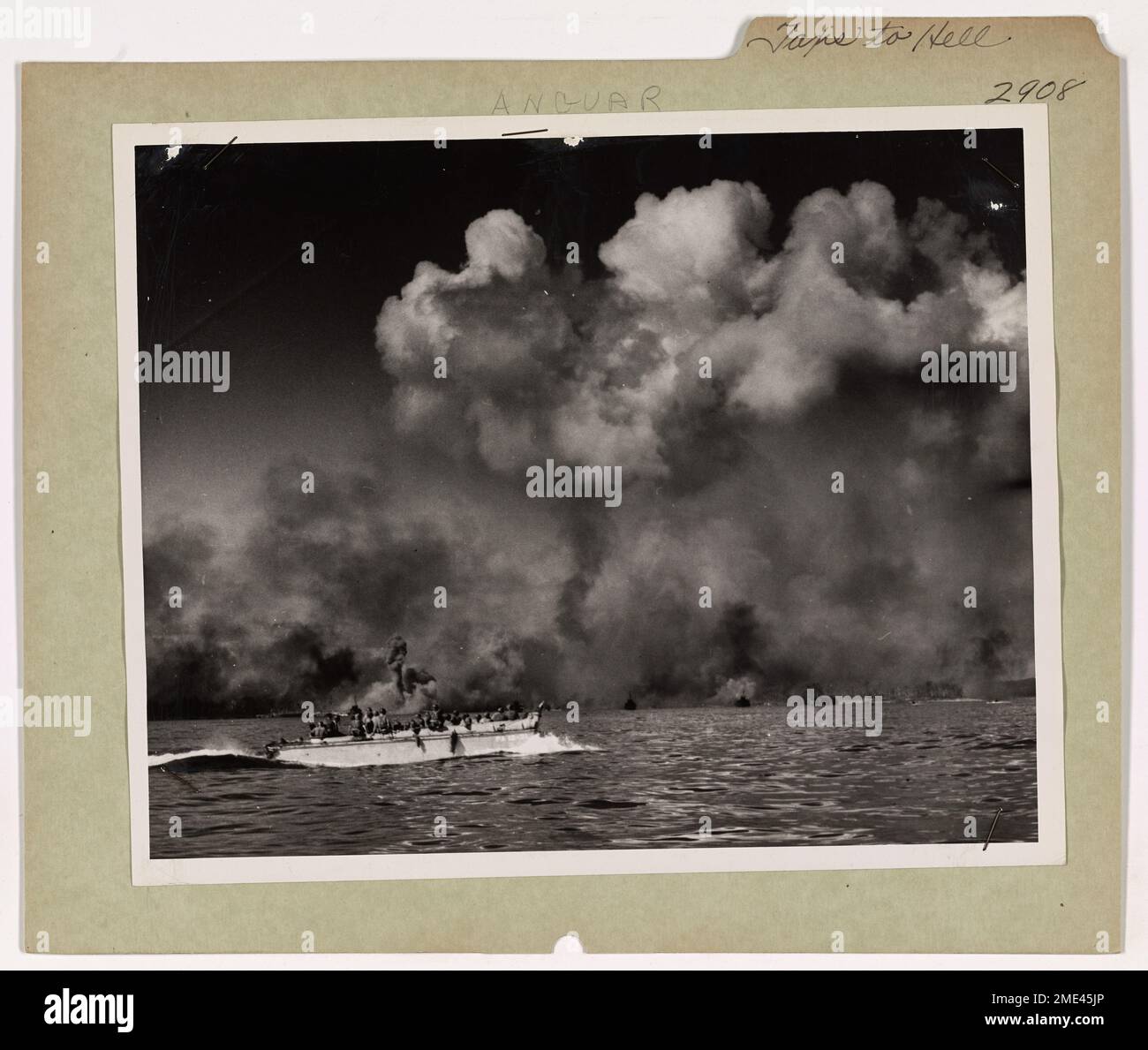 A Coast Guard-manned invasion barge heads toward the explosive beach of ...