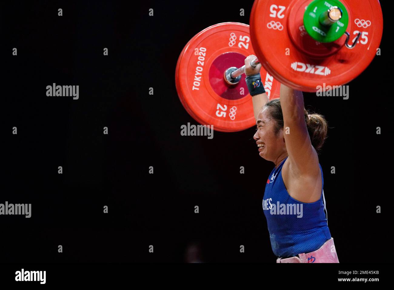 Hidilyn Diaz of Philippines celebrates as she competes and sets new ...