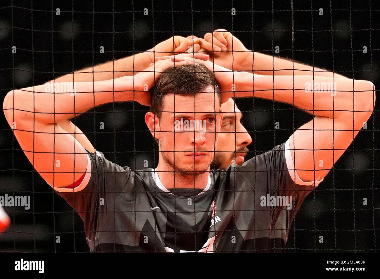 Canada's Graham Vigrass and Stephen Timothy Maar, place their hands on ...