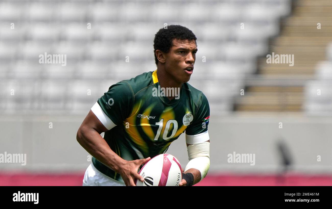 South Africa's Kurt-Lee Arendse runs with the ball against Ireland ...