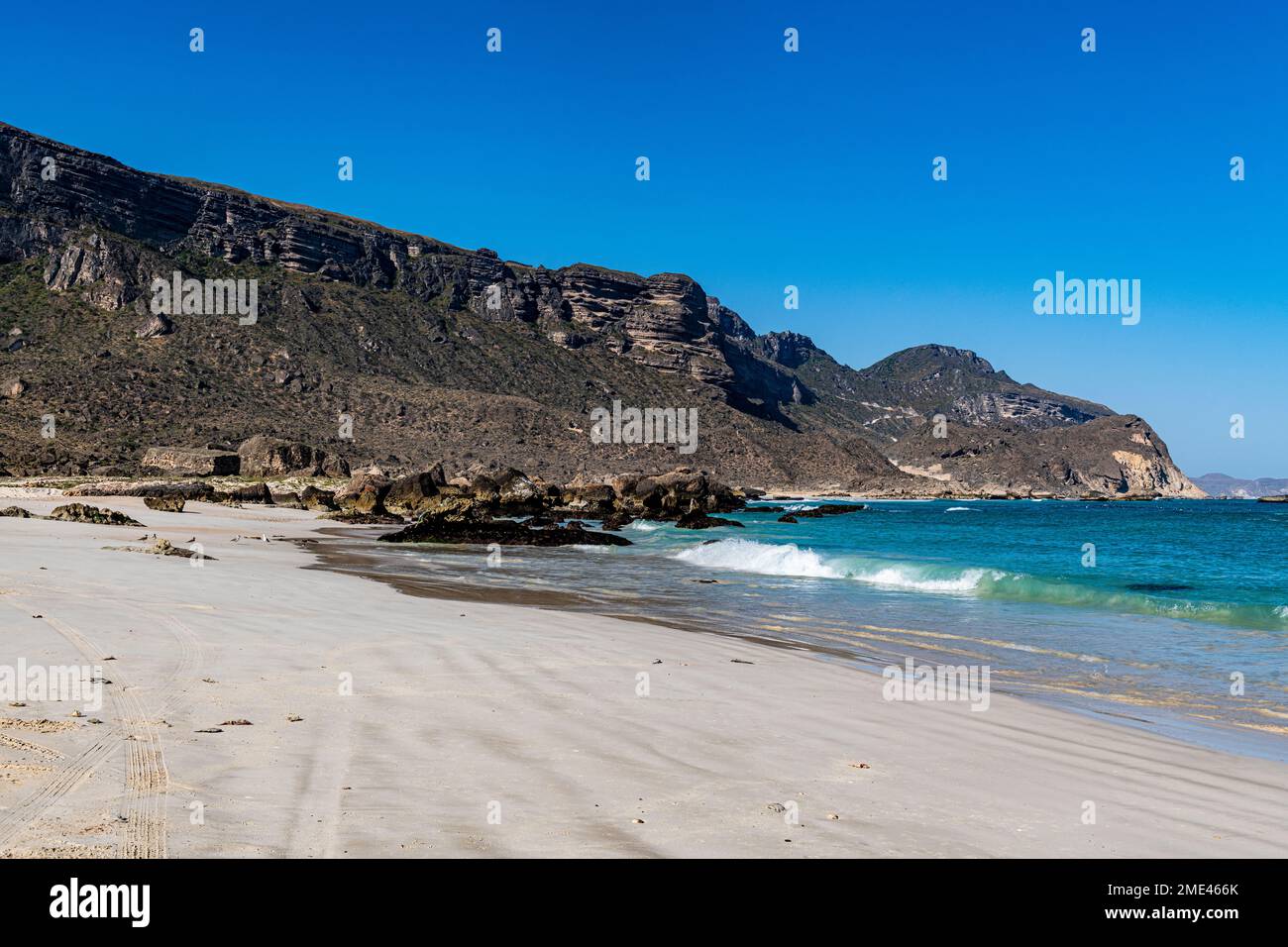 Oman, Dhofar, Salalah, Fazayah Beach and surrounding cliffs Stock Photo ...