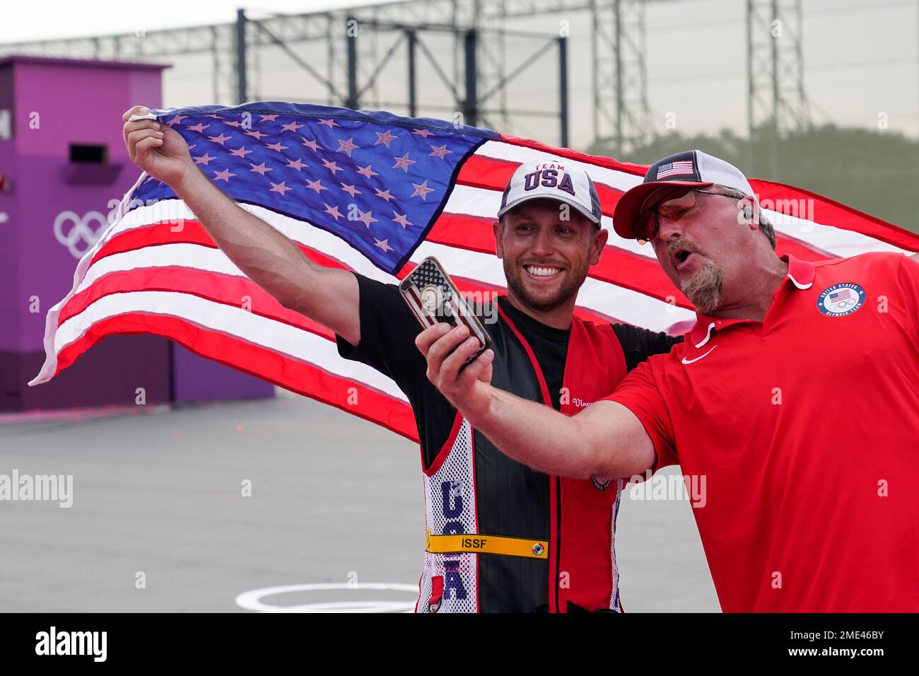Gold medalist Vincent Hancock, of the United States, takes a selfie ...