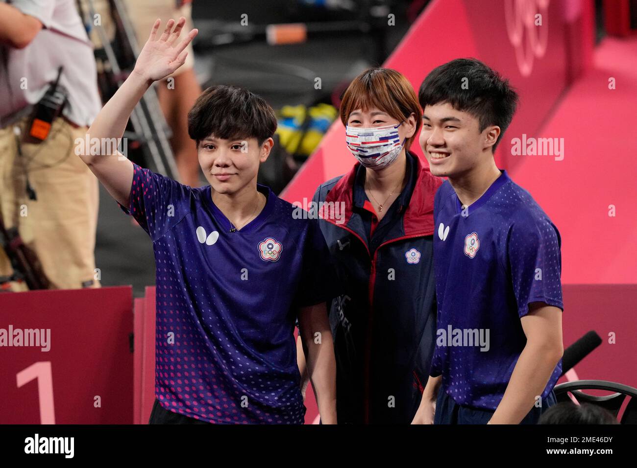 Taiwan's Lin Yun-Ju, left, and Cheng I-ching celebrate with their coach ...
